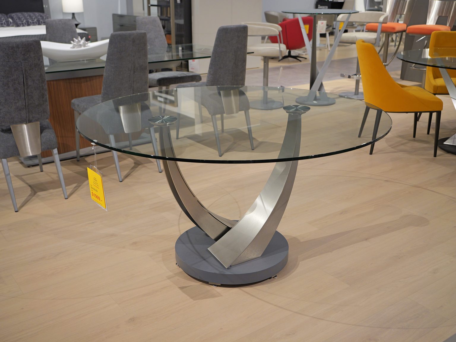 Tangent 54″ Round Table – Floor Sample – BOVA Furniture